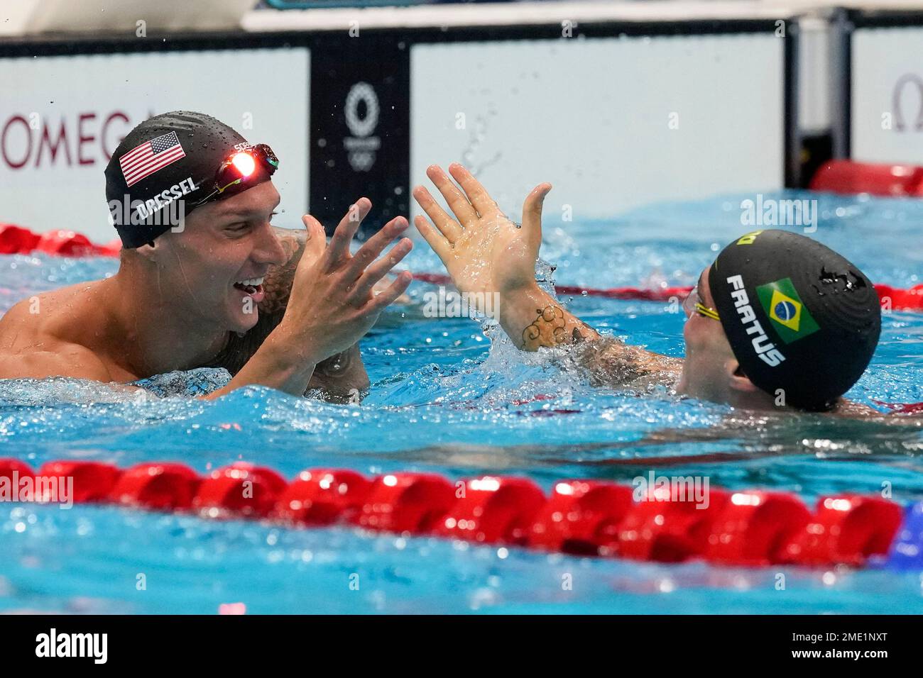 Caeleb Dressel, of United States, celebrates with Bruno Fratus, of ...