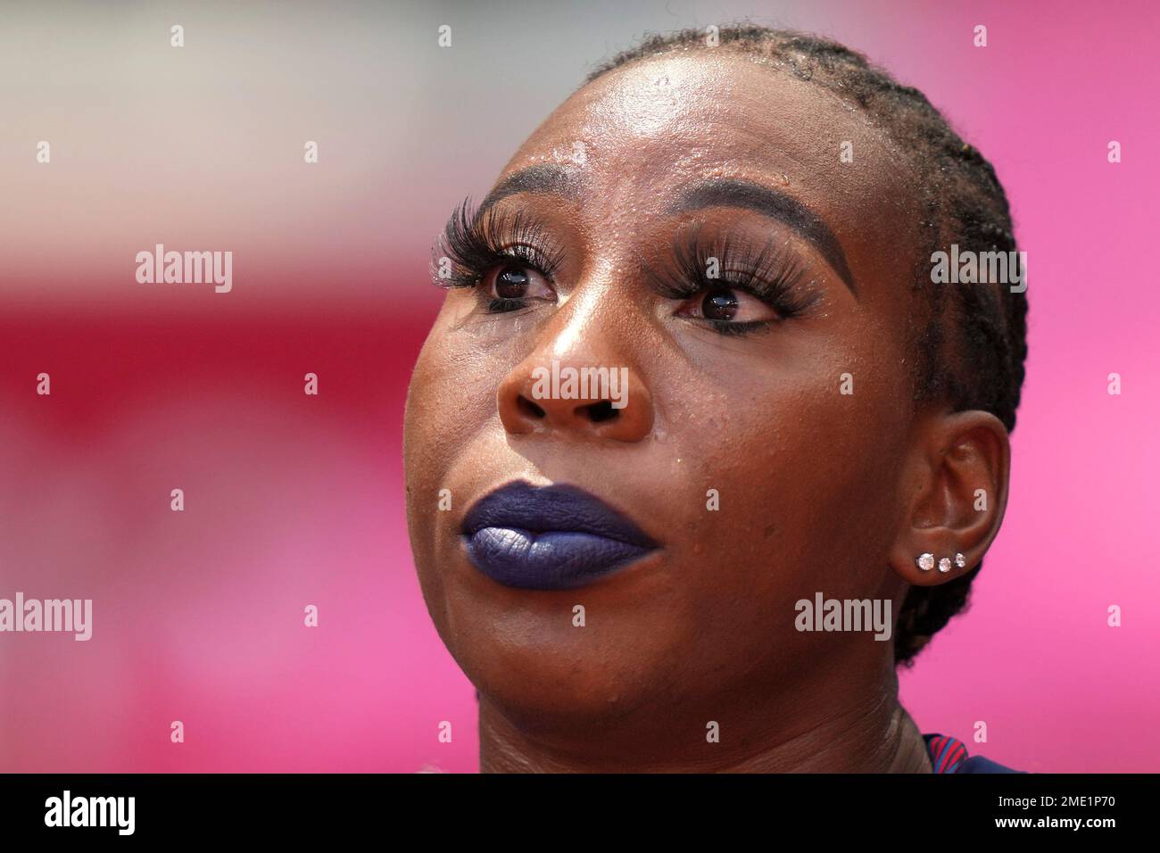 Gwen Berry, of the United States, waits to compete in the qualification ...