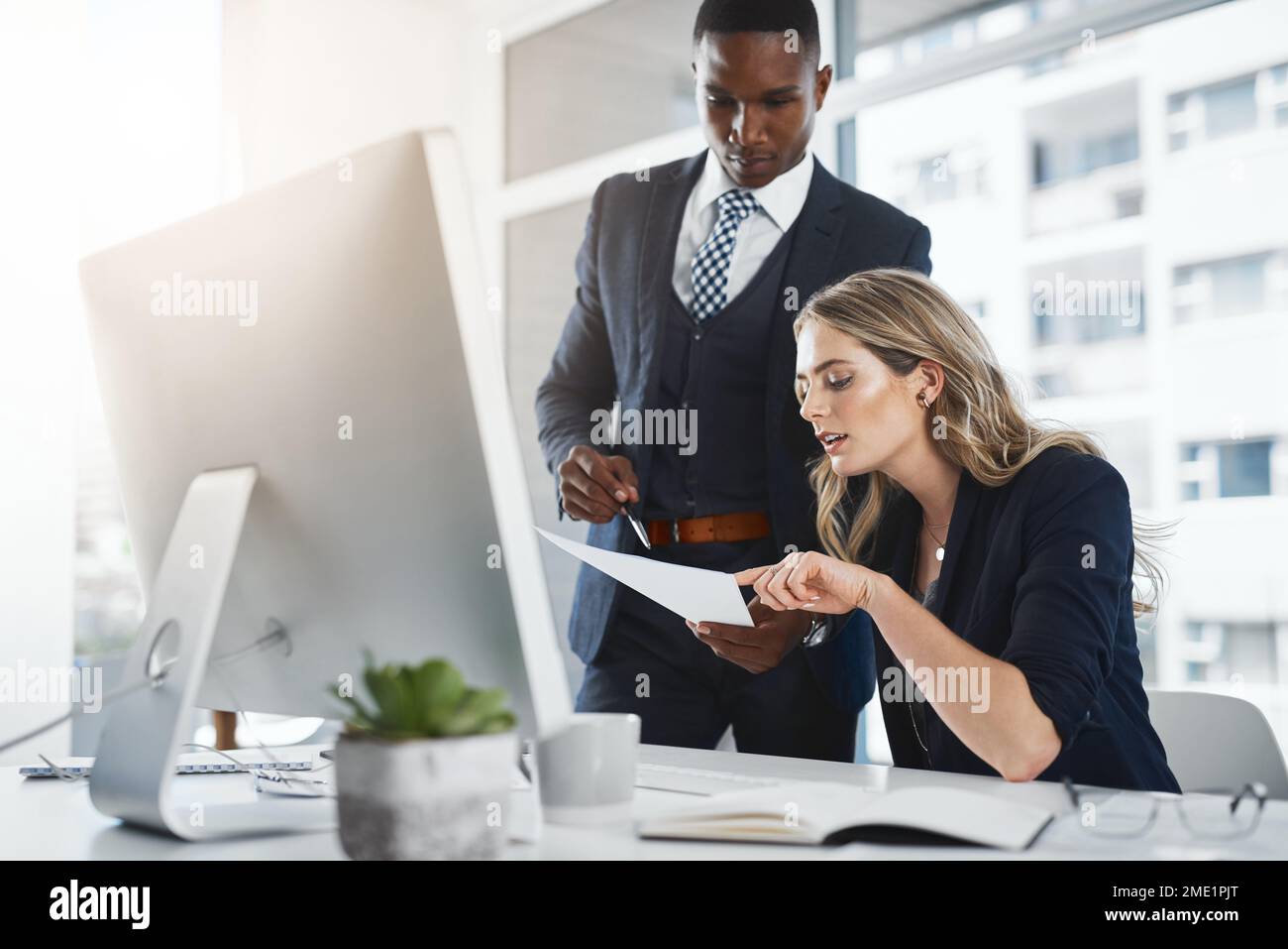 Nothing goes through without her authorization. two businesspeople ...