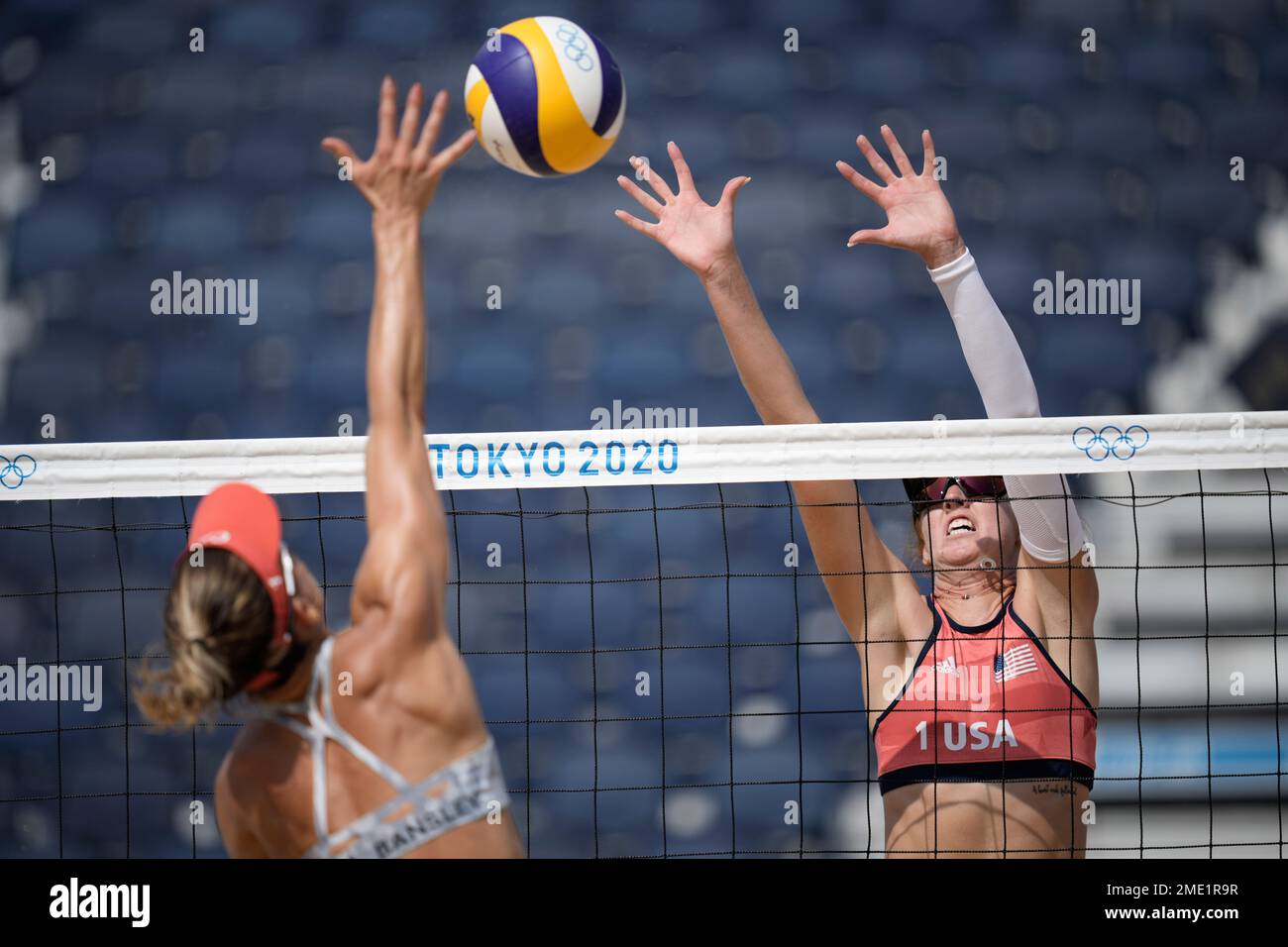 Heather Bansley, left, of Canada, takes a shot as Kelly Claes, of the ...