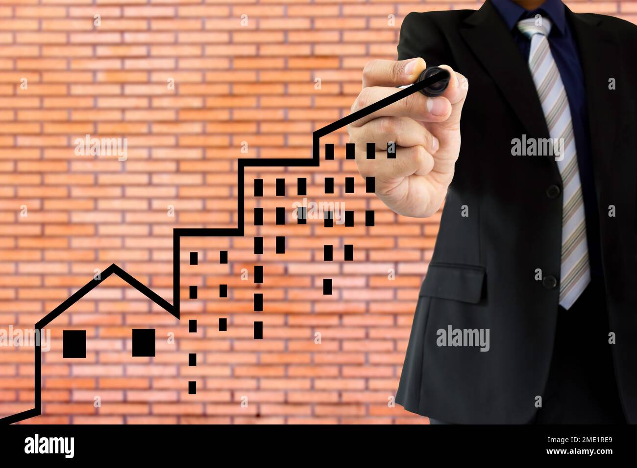 businessman is making a positive trend in investment real estate ...