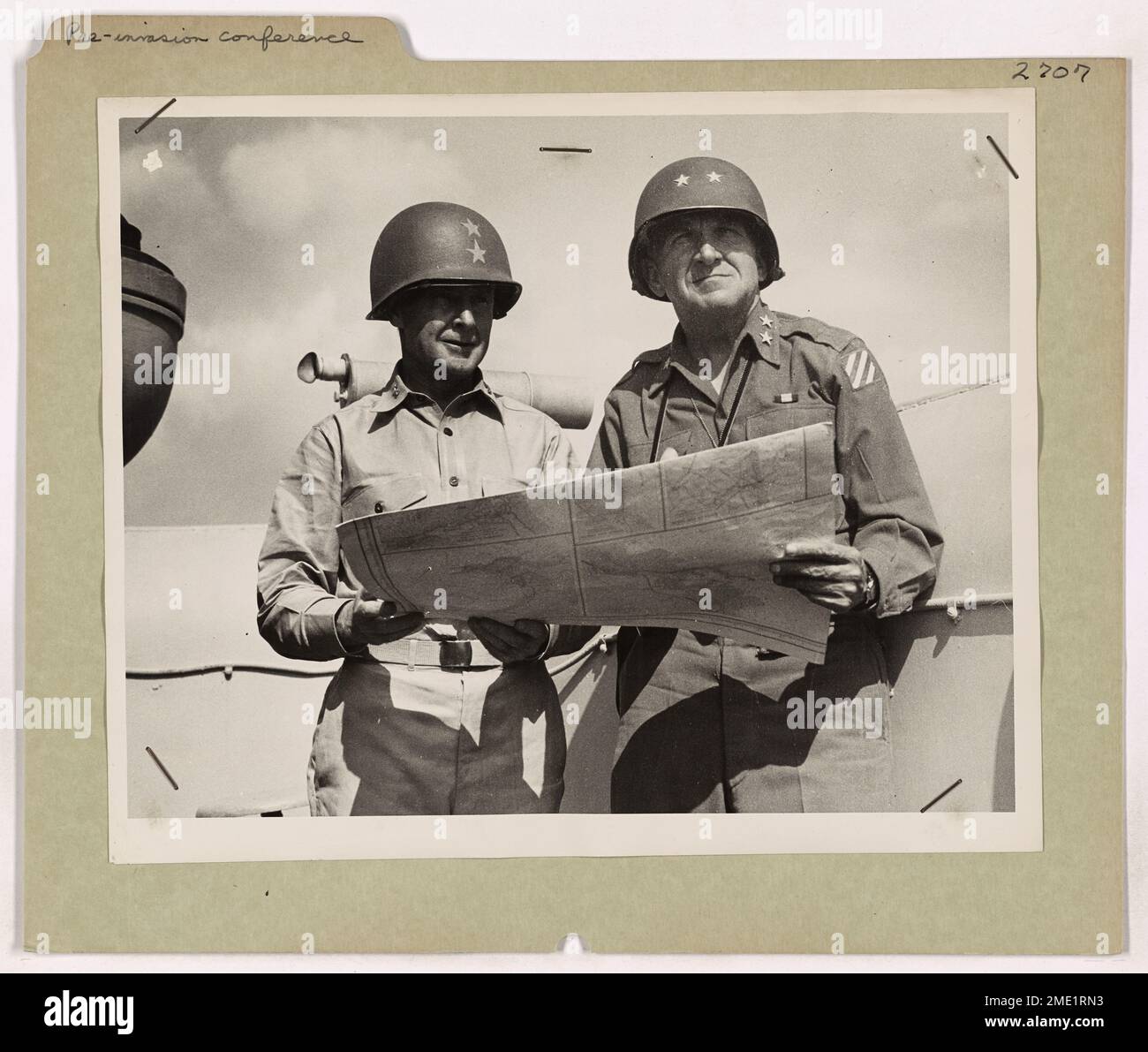 A pre-invasion conference aboard a Coast Guard combat cutter, where ...
