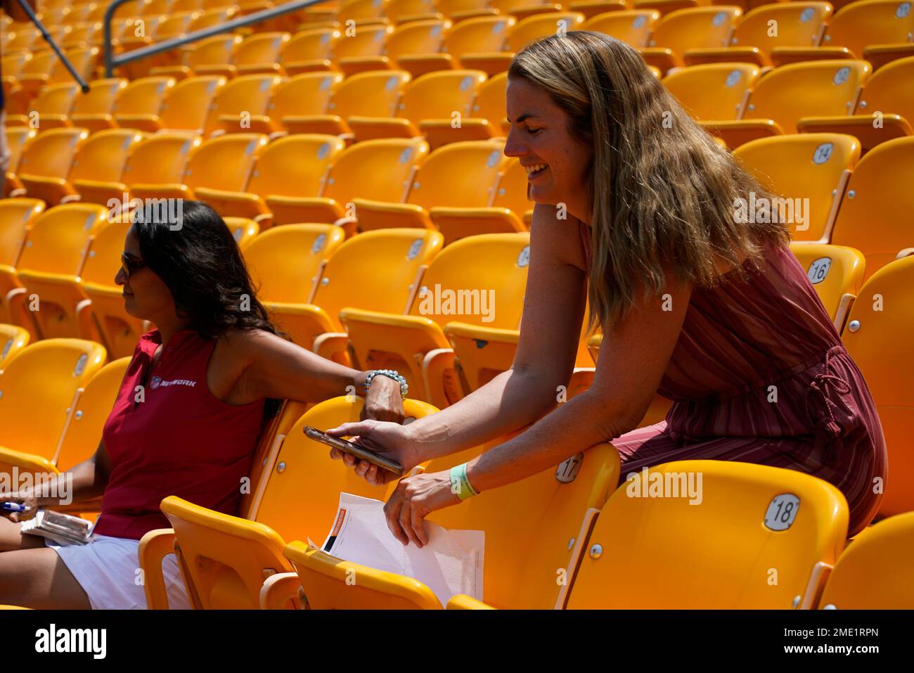 NFL Network sports reporter Aditi Kinkhabwala, left, and field producer ...