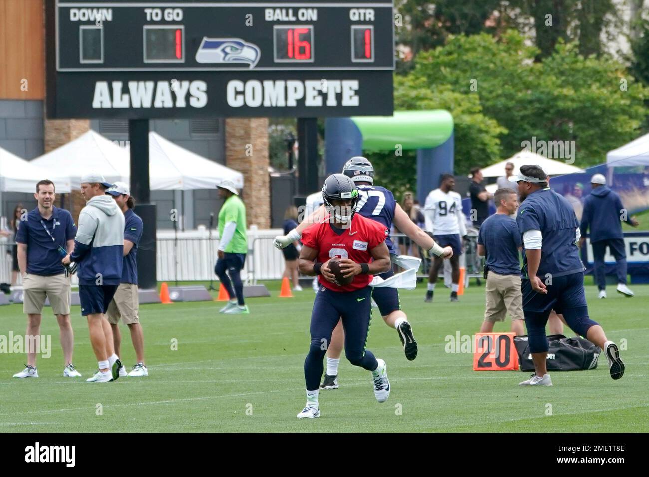 Seattle Seahawks quarterback Russell Wilson drops to pass during NFL ...