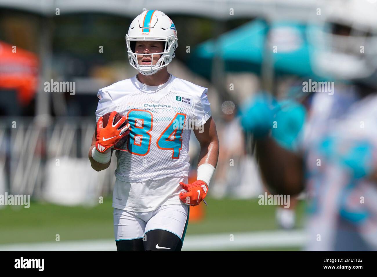 Miami Dolphins tight end Hunter Long (84) runs the ball during an NFL ...
