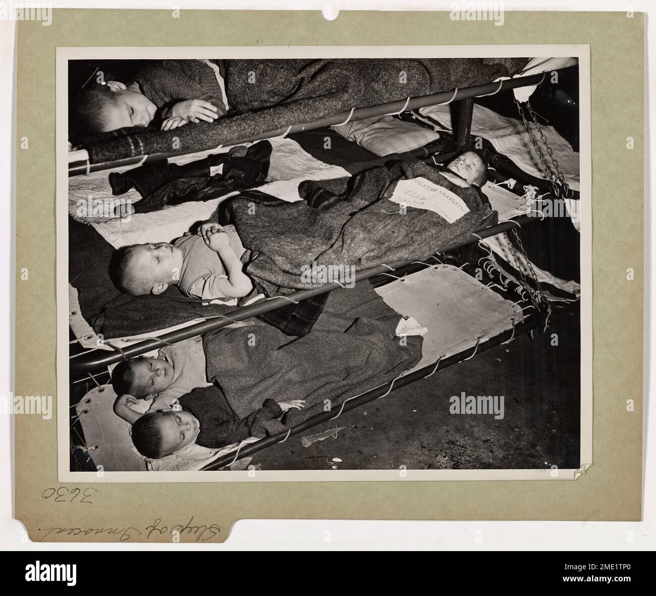 Polish orphans sleep peacefully aboard a Coast Guard-manned transport ...