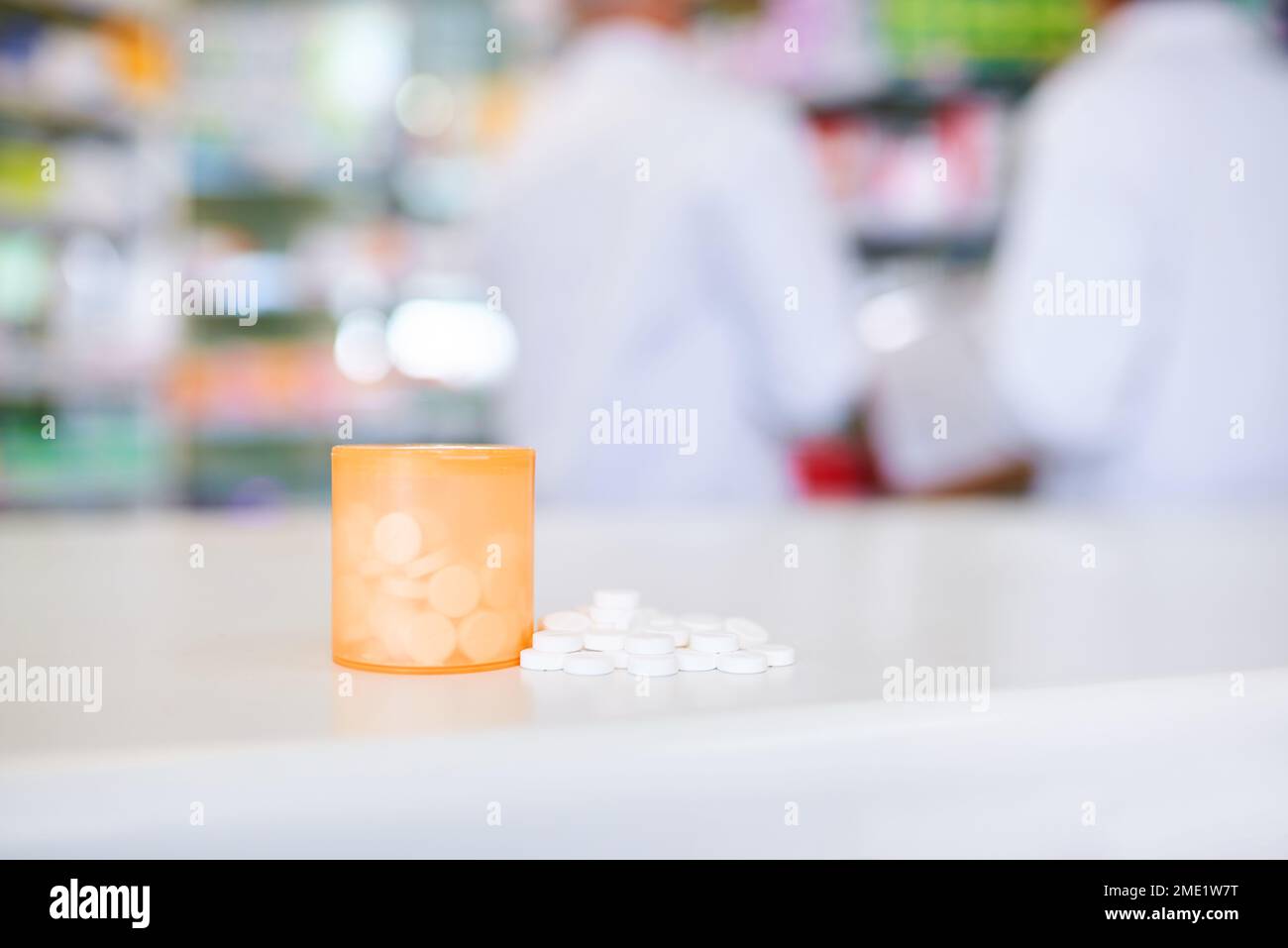 Meds to treat mild to moderate pain. a container filed with medication ...