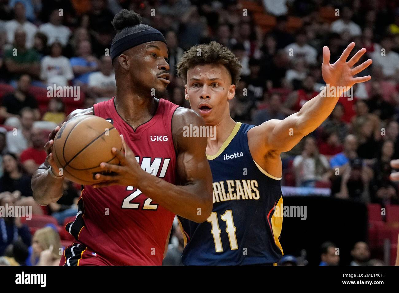 Miami Heat forward Jimmy Butler (22) drives to the basket against New Orleans Pelicans guard ...