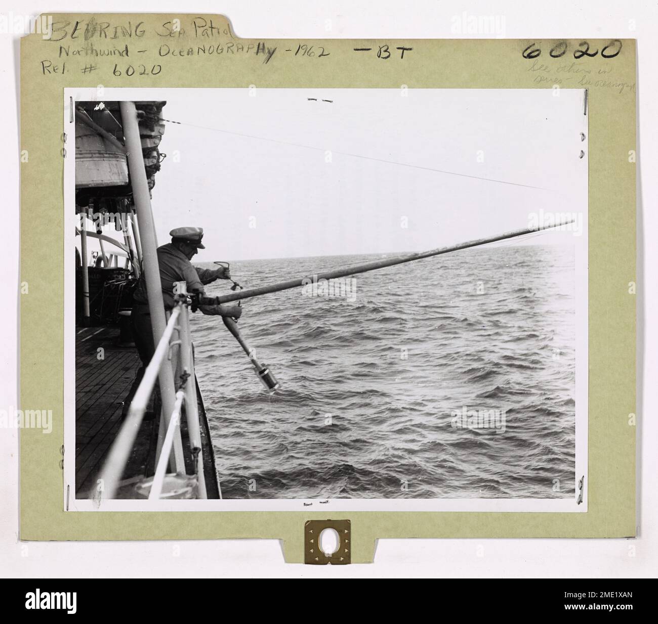 Taking Deep Sea Temperatures with Bathythermograph. Donald C. Bailey ...