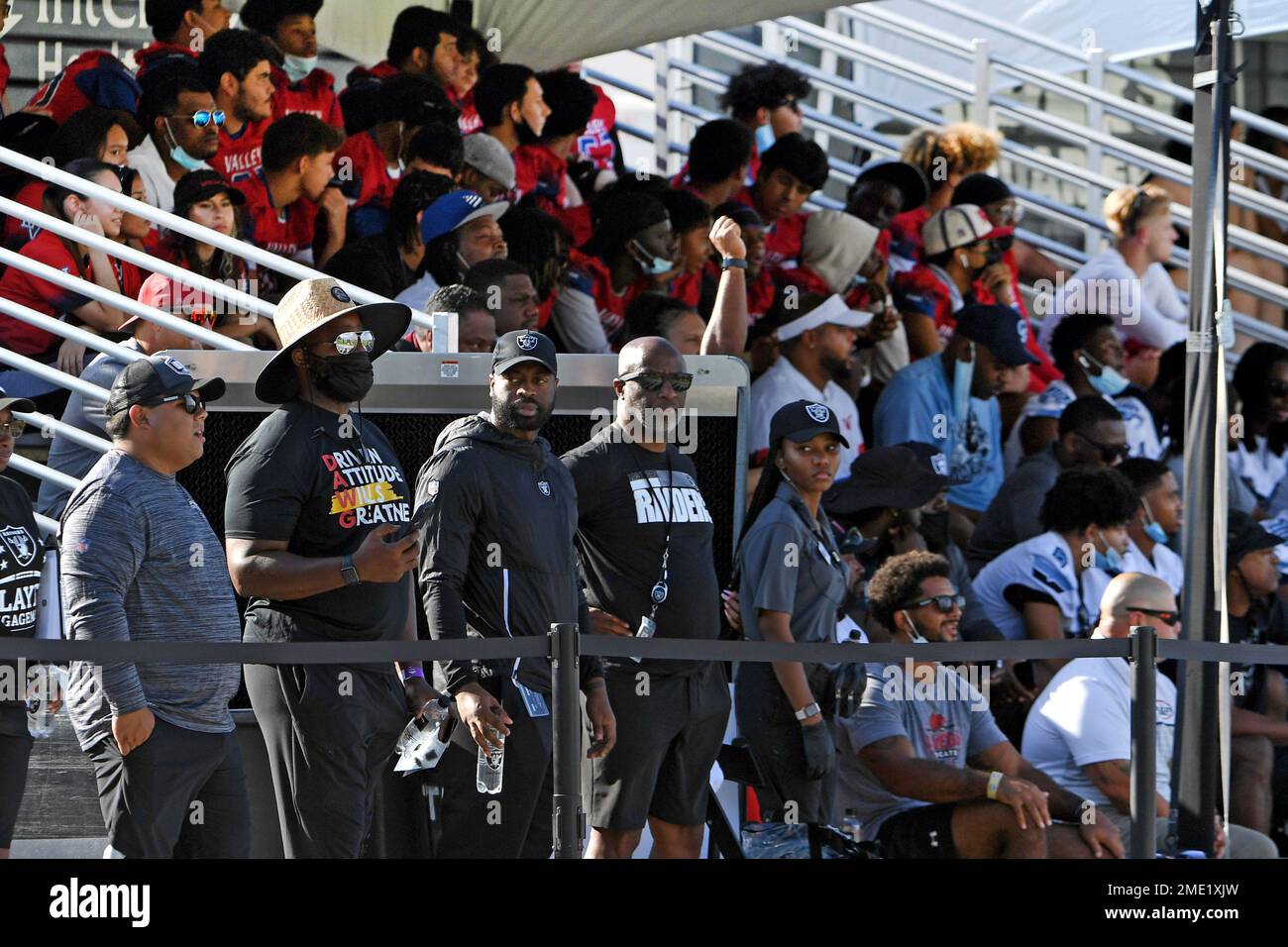 Las Vegas Raiders fans watch the team during an NFL football practice ...