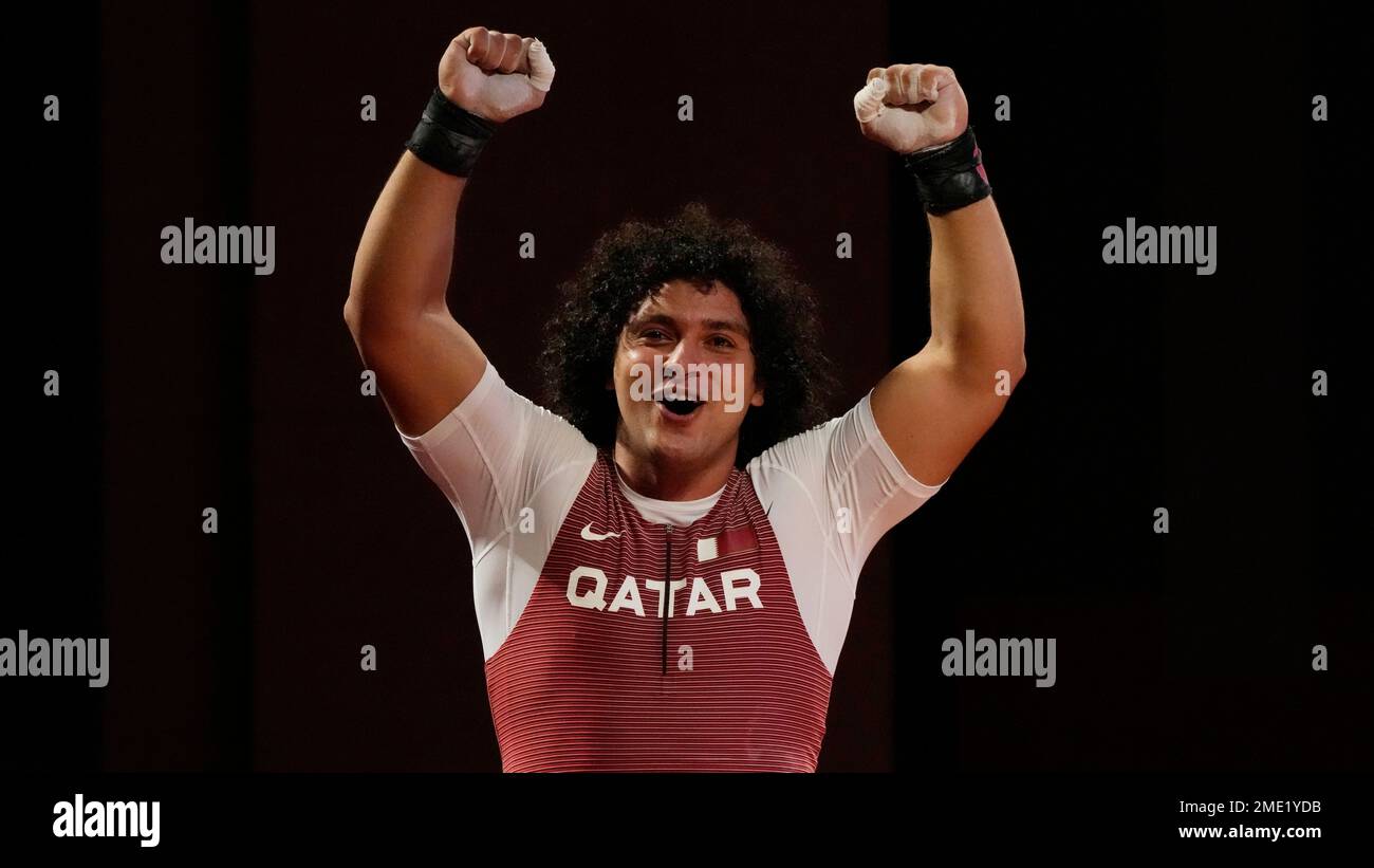 Fares Ibrahim Elbach of Qatar celebrates after winning the gold medal ...