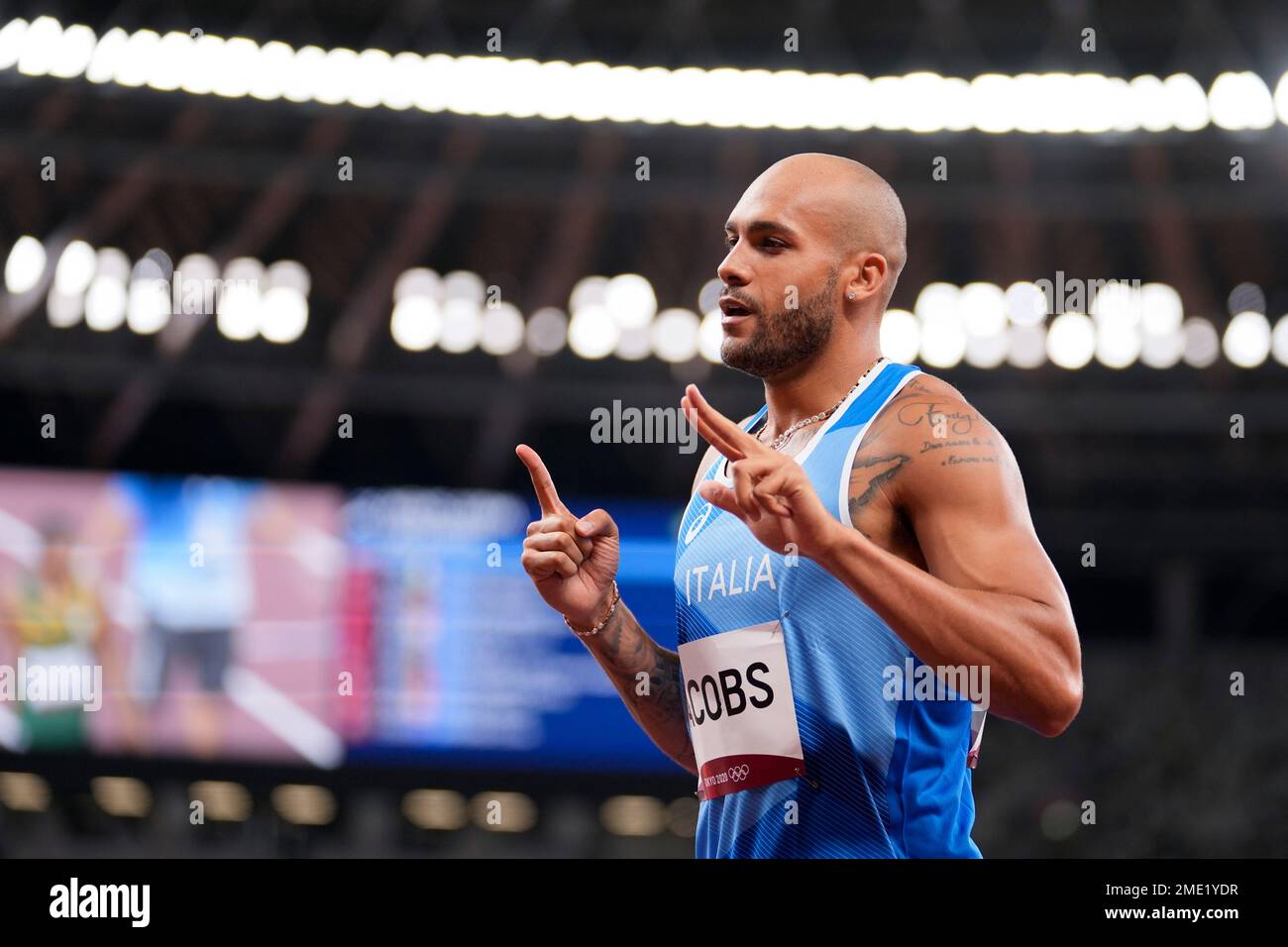 Lamont Jacobs, of Italy, wins a heat in the men's 100-meter run at the ...
