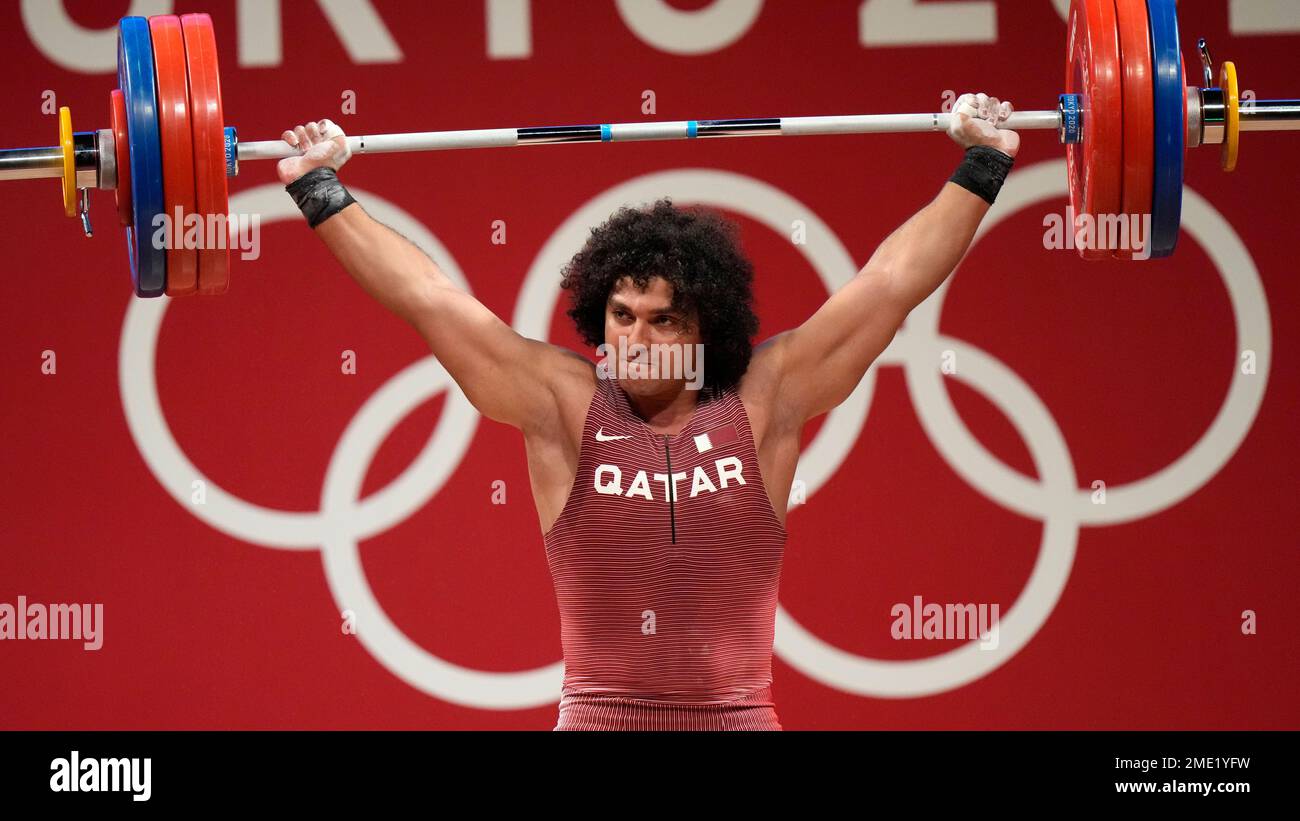 Fares Ibrahim Elbach of Qatar celebrates after winning the gold medal ...