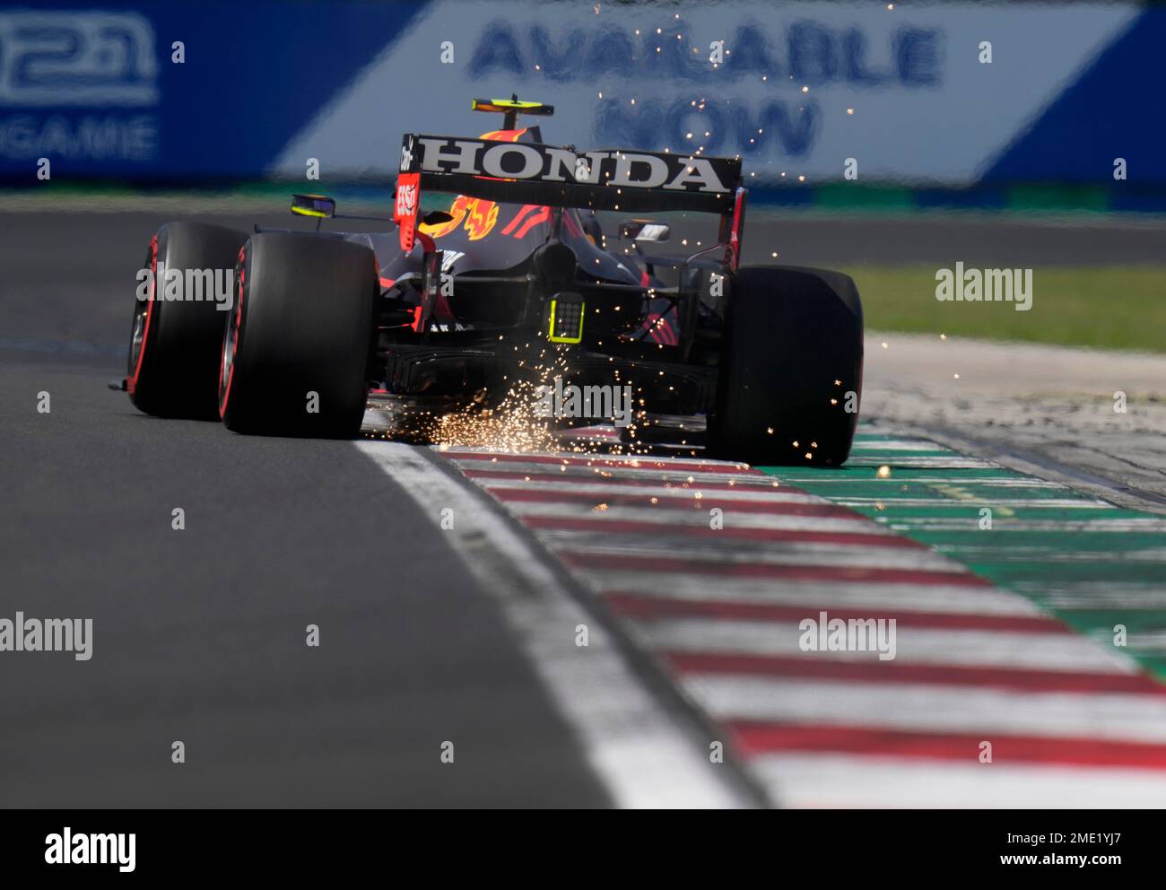 Red Bull driver Sergio Perez of Mexico steers his car during the qualifying session for the ...