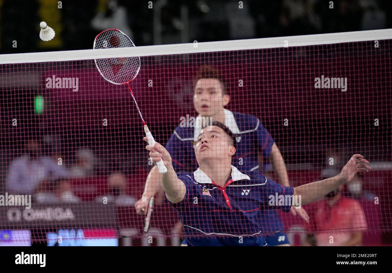 Malaysia's Malaysia's Aaron Chia, front, and Soh Wooi Yik play against Indonesia's Mohammad ...