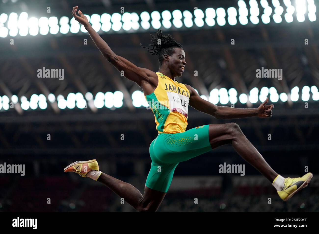 Tajay Gayle, of Jamaica, competes in the qualification rounds of the ...