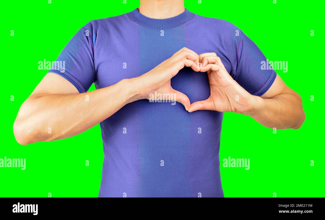 man making the heart shape with his hands in concept of love for ...