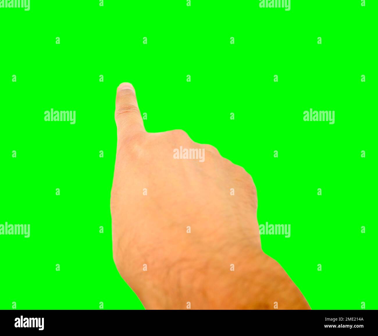 Close-up of man hand pointing over isolated cutout on green background ...