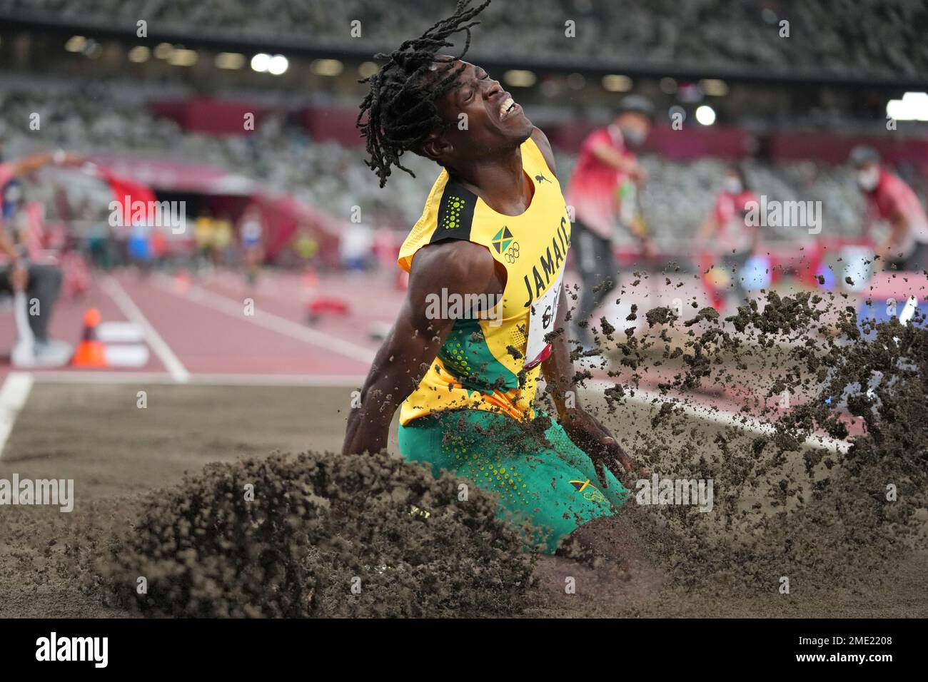 Tajay Gayle, of Jamaica, competes in the qualification rounds of the ...