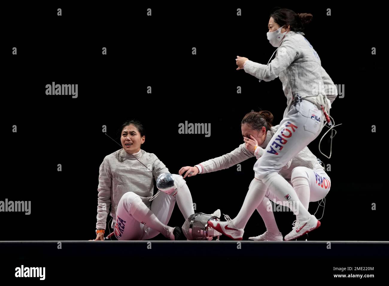 Kim Jiyeon of South Korea, left, celebrate defeating Rossella Gregorio ...