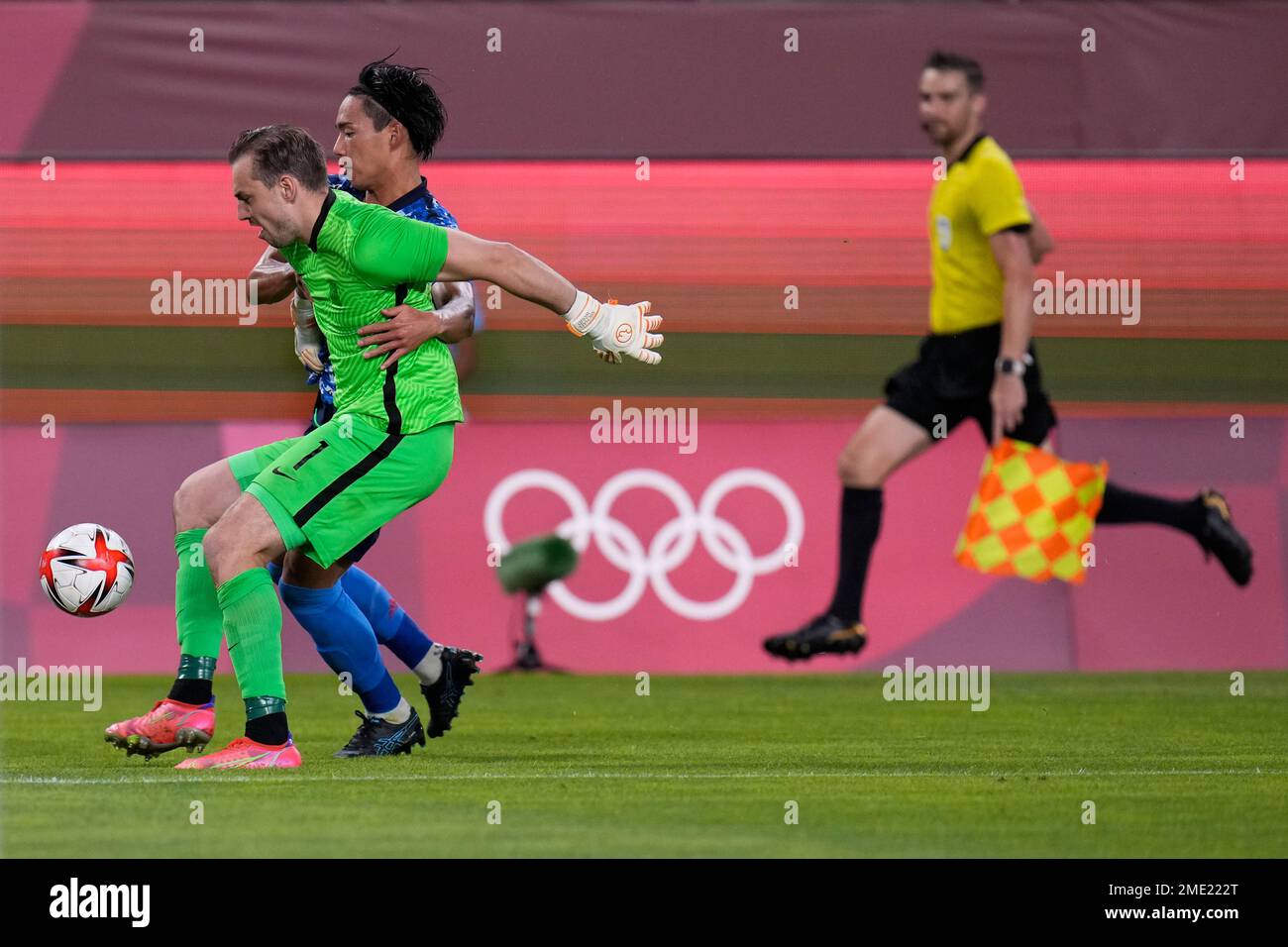 New Zealand's goalkeeper Michael Woud and Japan's Daichi Hayashi battle ...