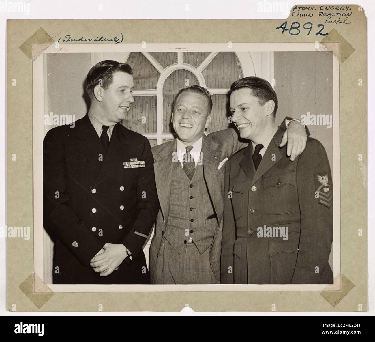Three Coast Guardsmen, nicknamed Proton,Electron, and Neutron, are ...