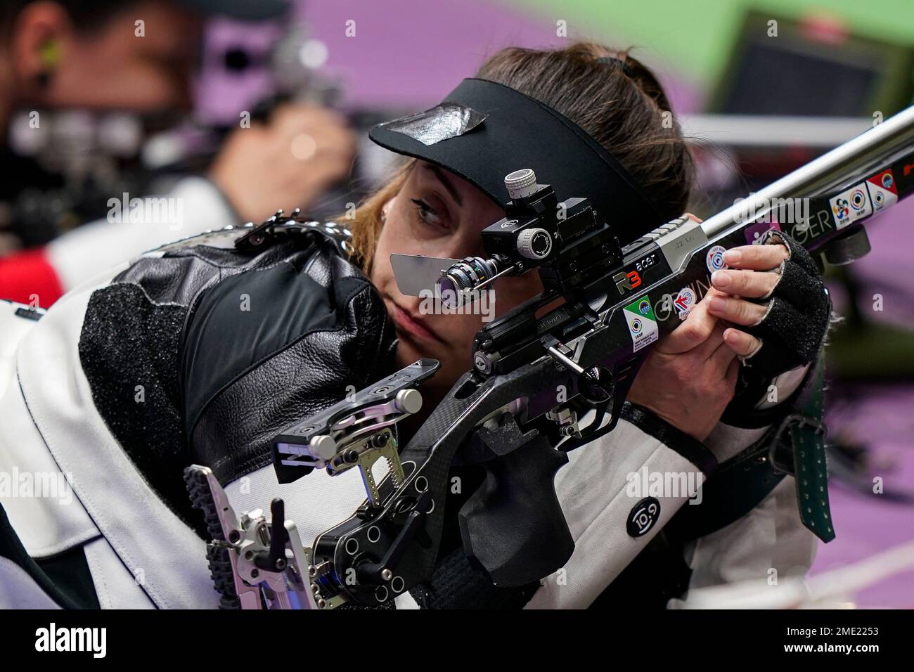 Andrea Arsovic, of Serbia, looks at her coach as she competes in the ...