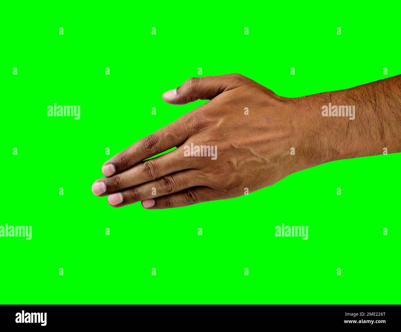 black man offering open hand isolated cutout on green background with ...