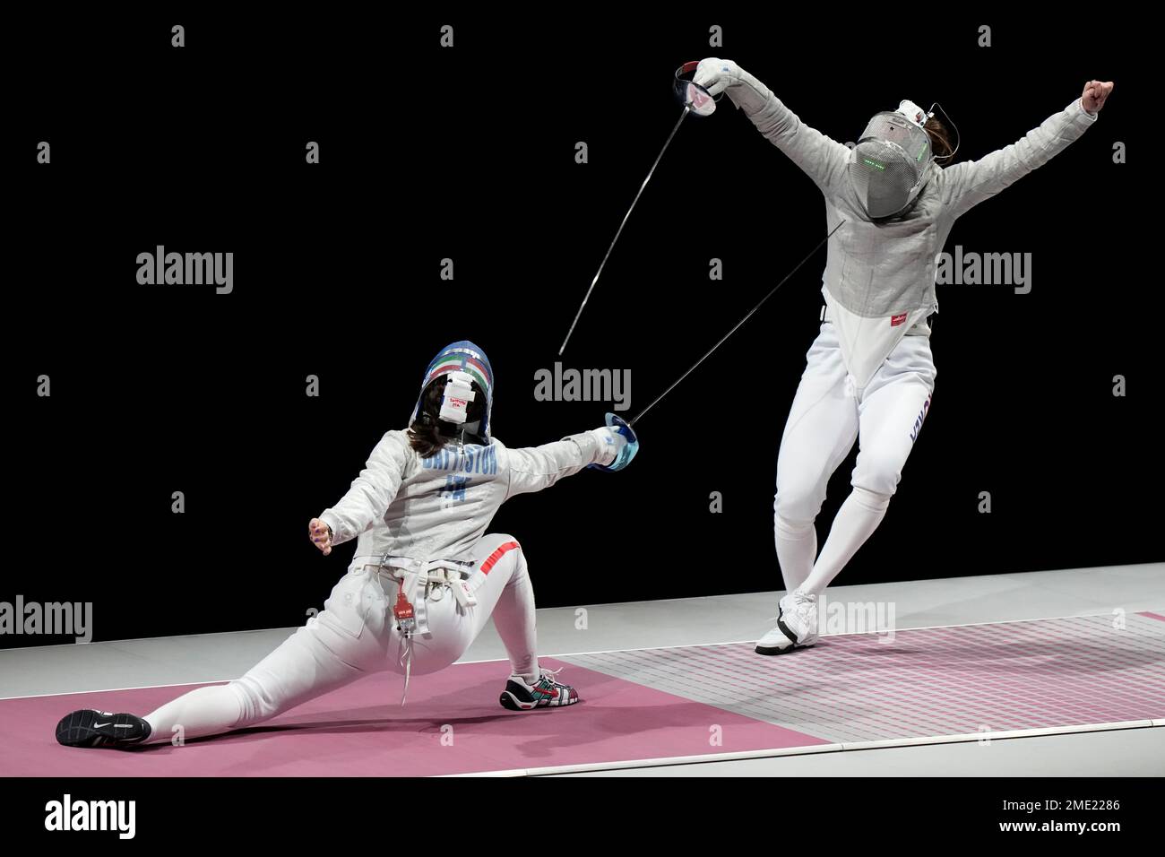 Michela Battiston of Italy, left, and Yoon Jesu of South Korea compete ...