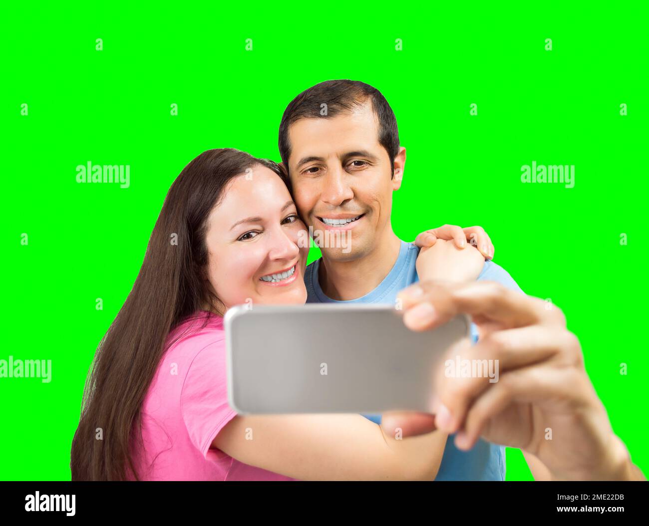 Cropped shot of a young couple taking a selfie on isolated cutout on ...