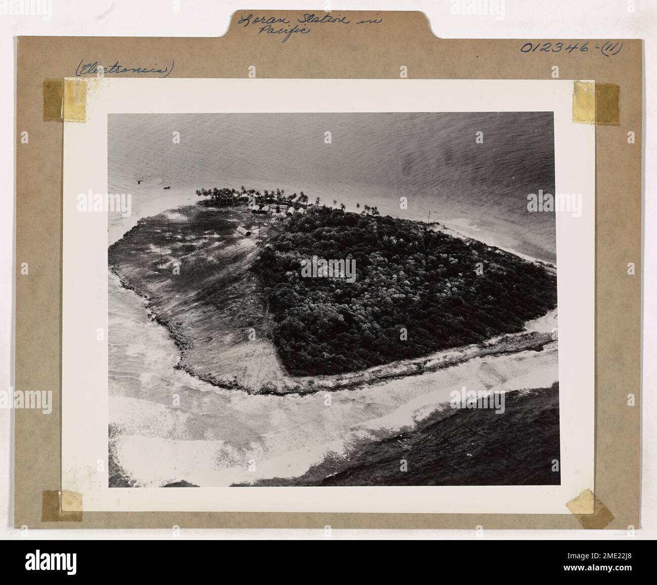 An aerial view of a Loran Station located on a Pacific Atoll ...