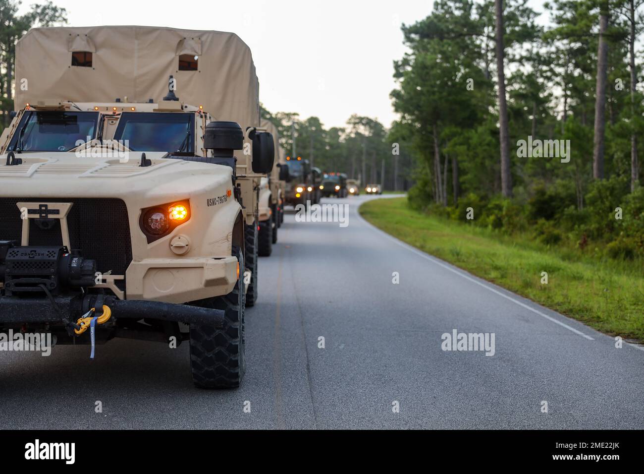 U.S. Marine Corps tactical vehicles convoy behind Marines with 8th ...