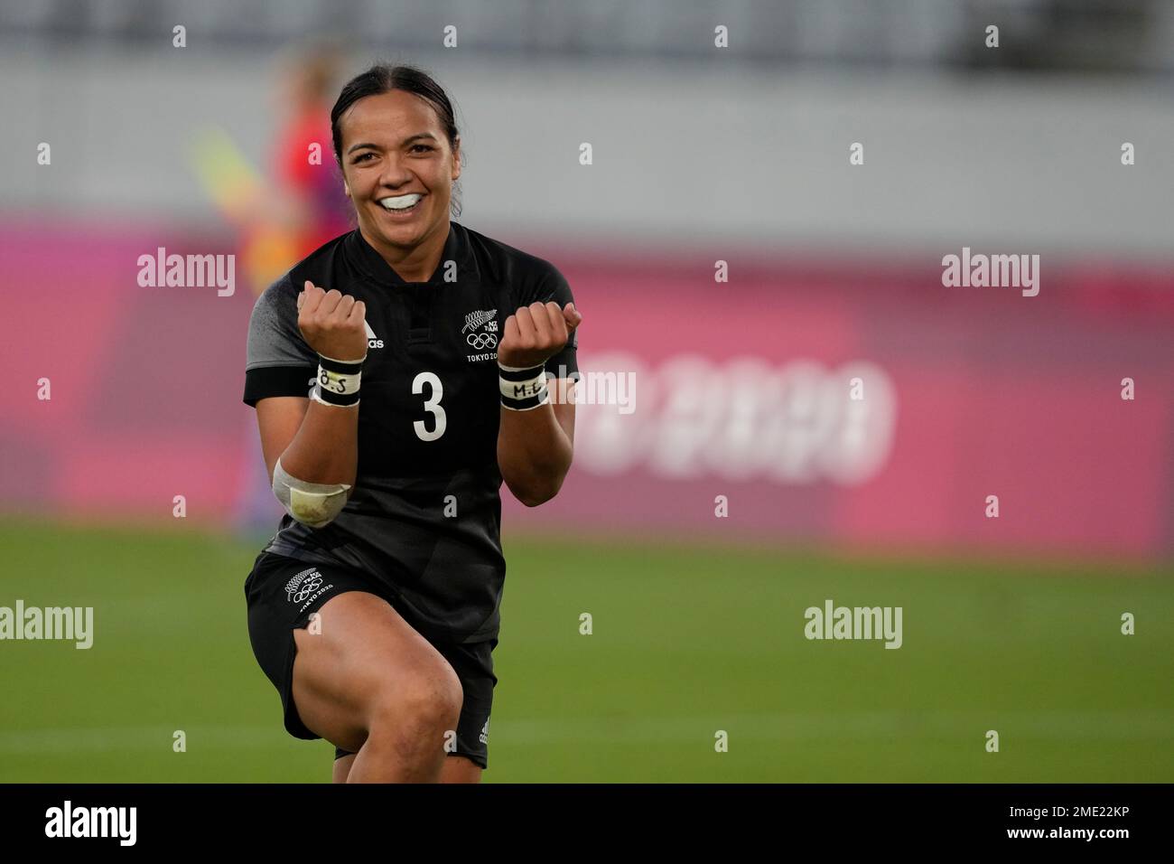 New Zealand's Stacey Fluhler reacts after scoring a try in the women's ...