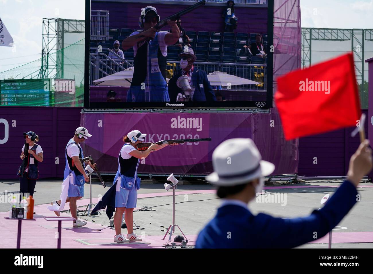 An official signals a missed target as Alessandra Perilli, right, of ...
