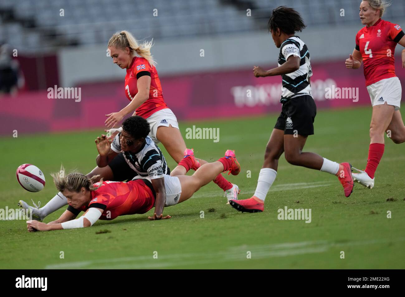 Britain's Hannah Smith, bottom, and Fiji's Rusila Nagasau fight for the ...