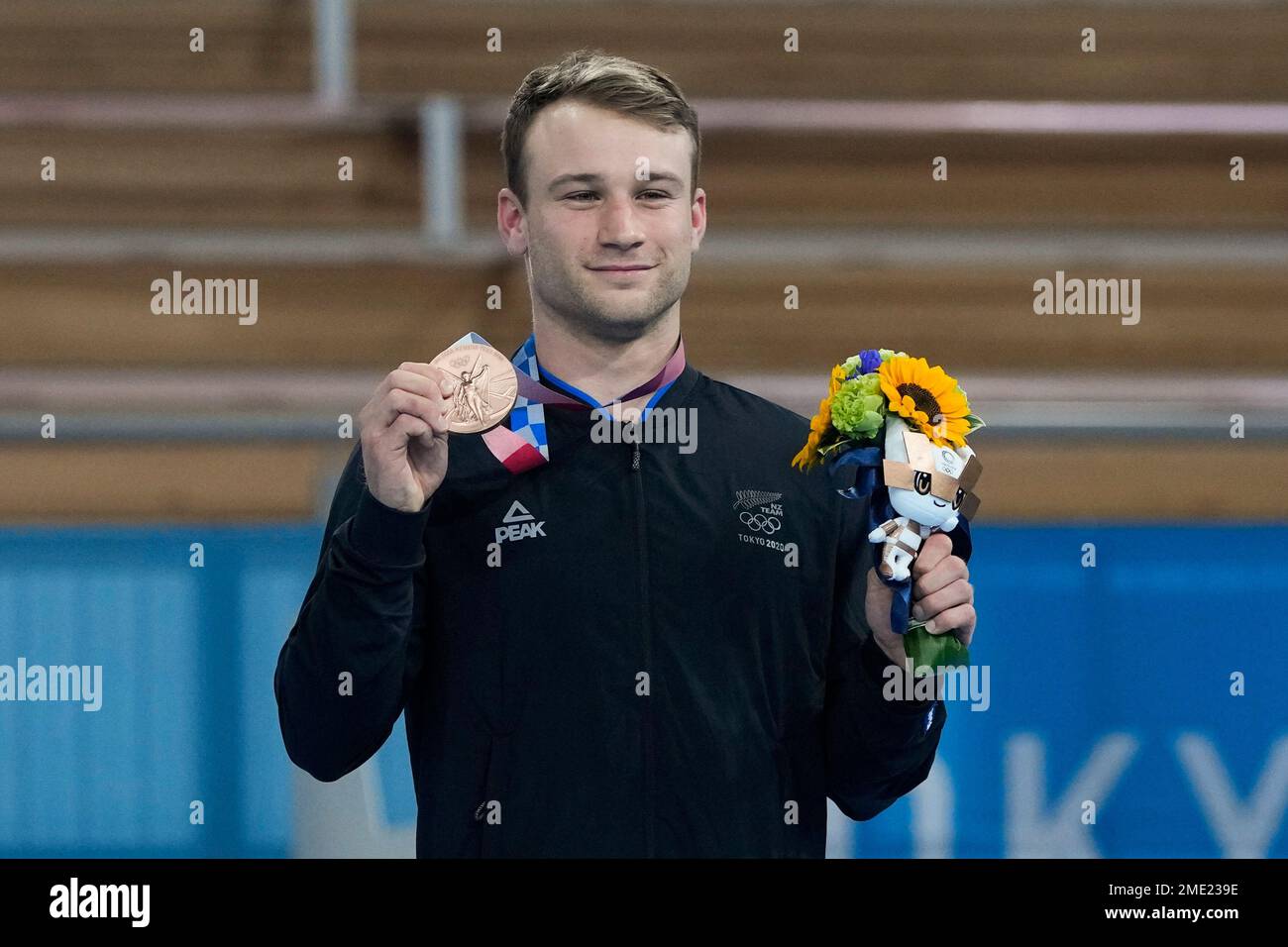 Bronze medalist Dylan Schmidt, of New Zealand, poses for a photo during ...