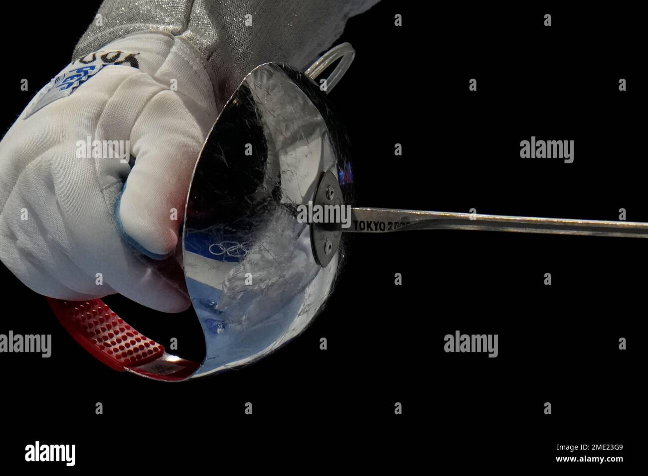 The Olympic rings are reflected in the men's individual Sabre team ...