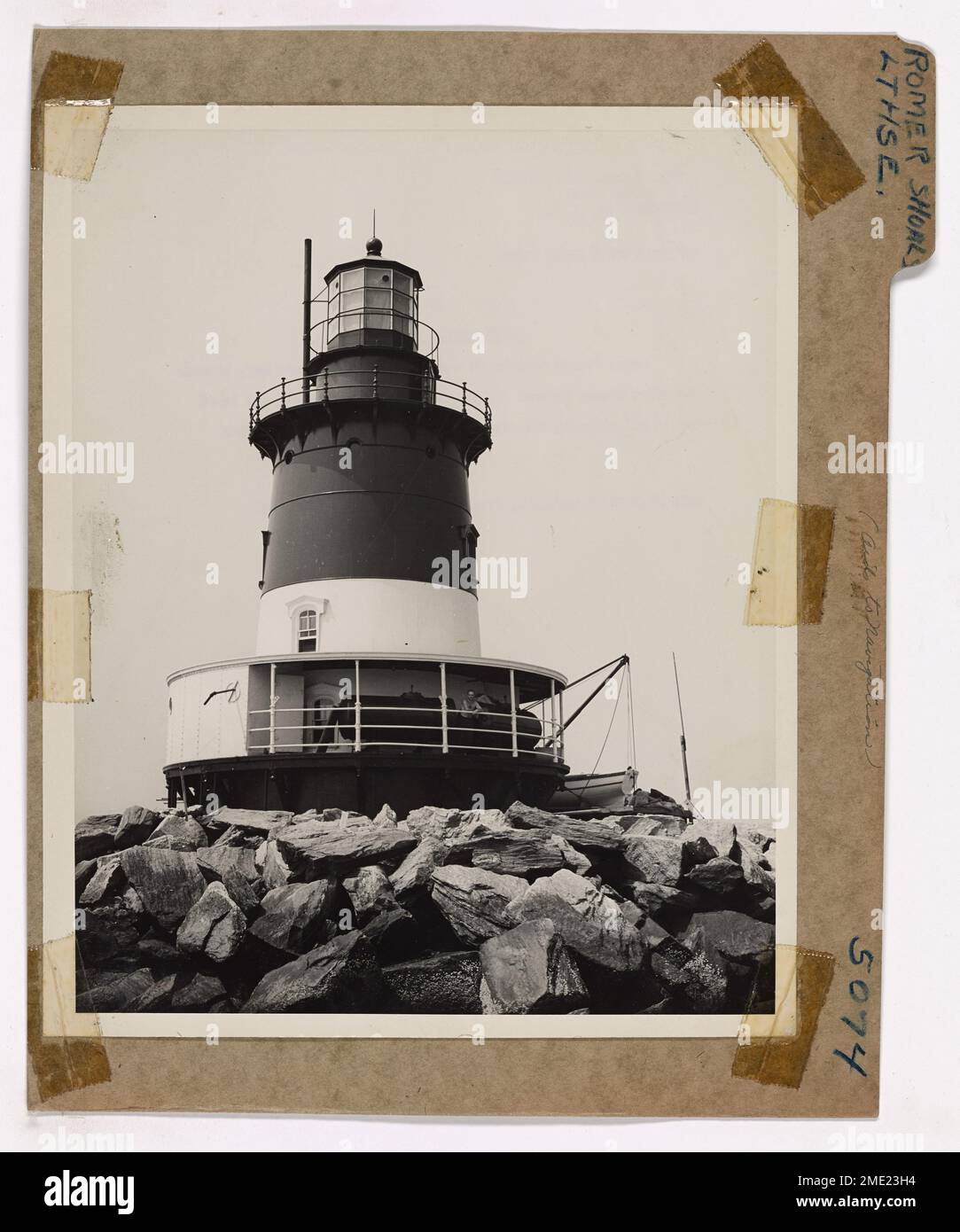 An individual stands on the lower porch of the Romer Shoals Lighthouse ...