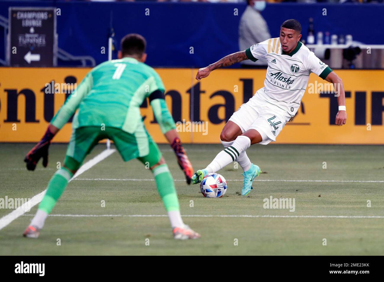 Portland Timbers midfielder Marvin Loria, right, controls the ball in ...