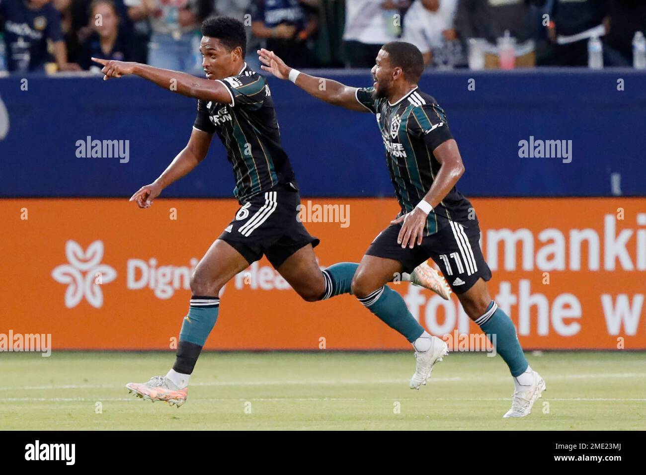 LA Galaxy midfielder Rayan Raveloson (6) celebrates his goal against ...