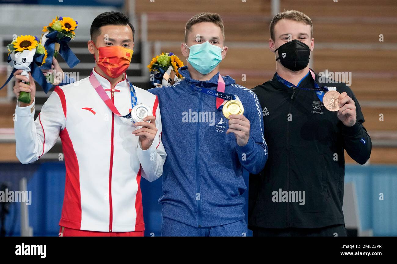 From left, silver medallist Dong Dong, of China, gold medallist Ivan ...