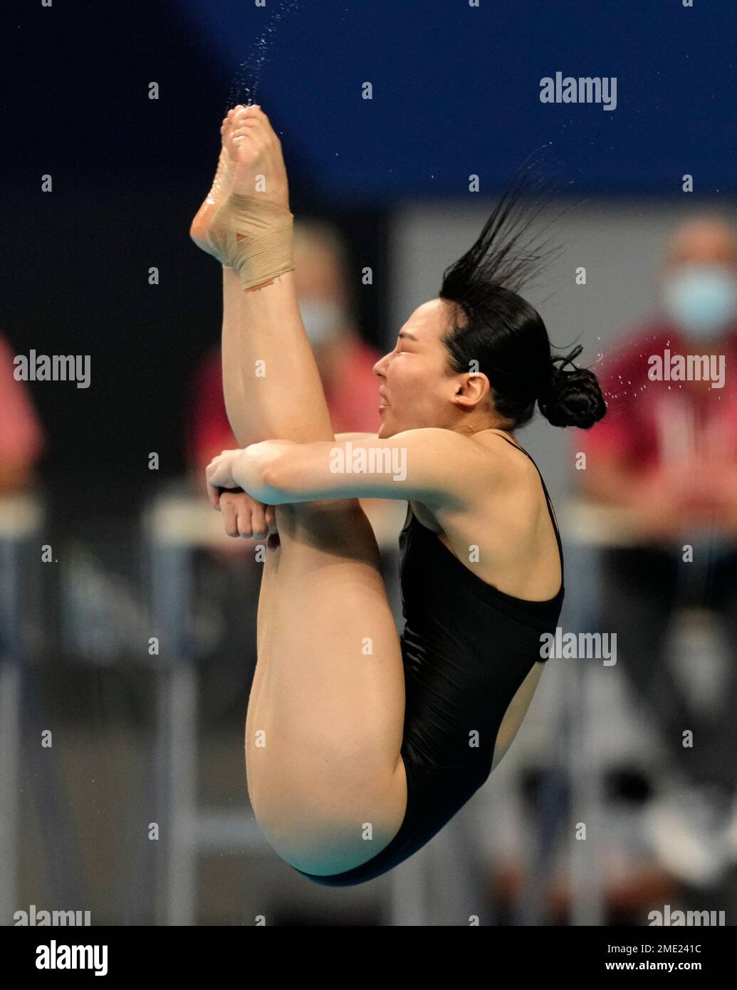 Suji Kim of Korea competes in women's diving 3m springboard semifinal ...