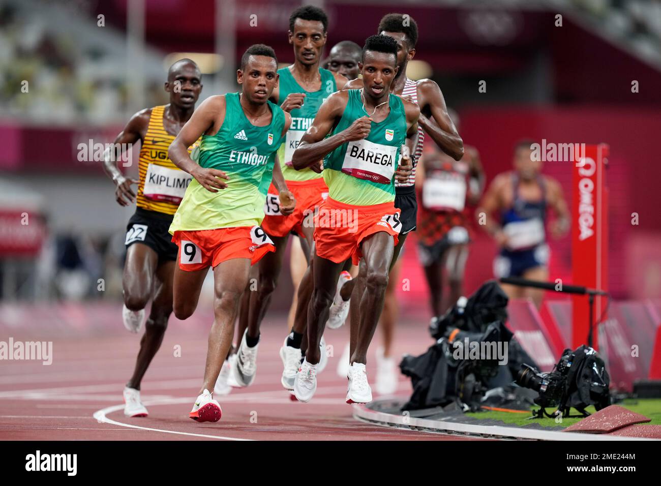 Selemon Barega, of Ethiopia, takes the lead in the men's 10,000-meter ...
