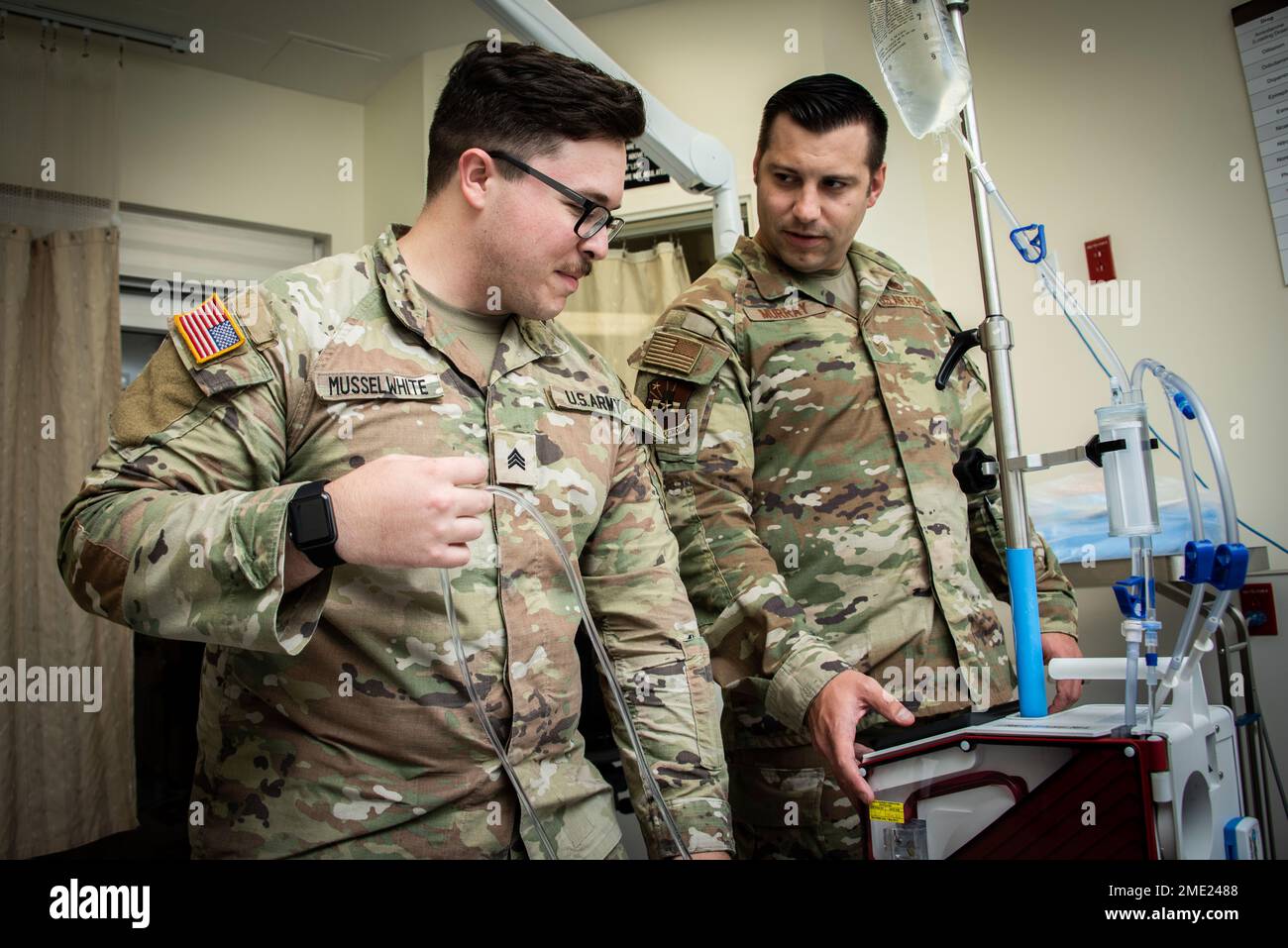 U.S. Army Sgt. Christopher Musselwhite, healthcare specialist, and U.S ...