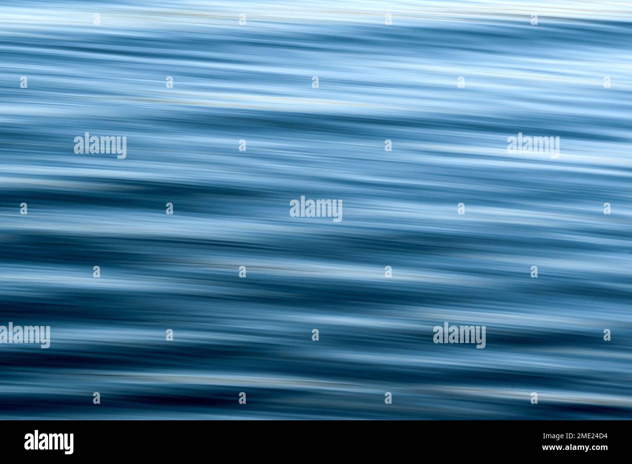 Abstract pattern formed by flowing water with slow shutter used to blur ...