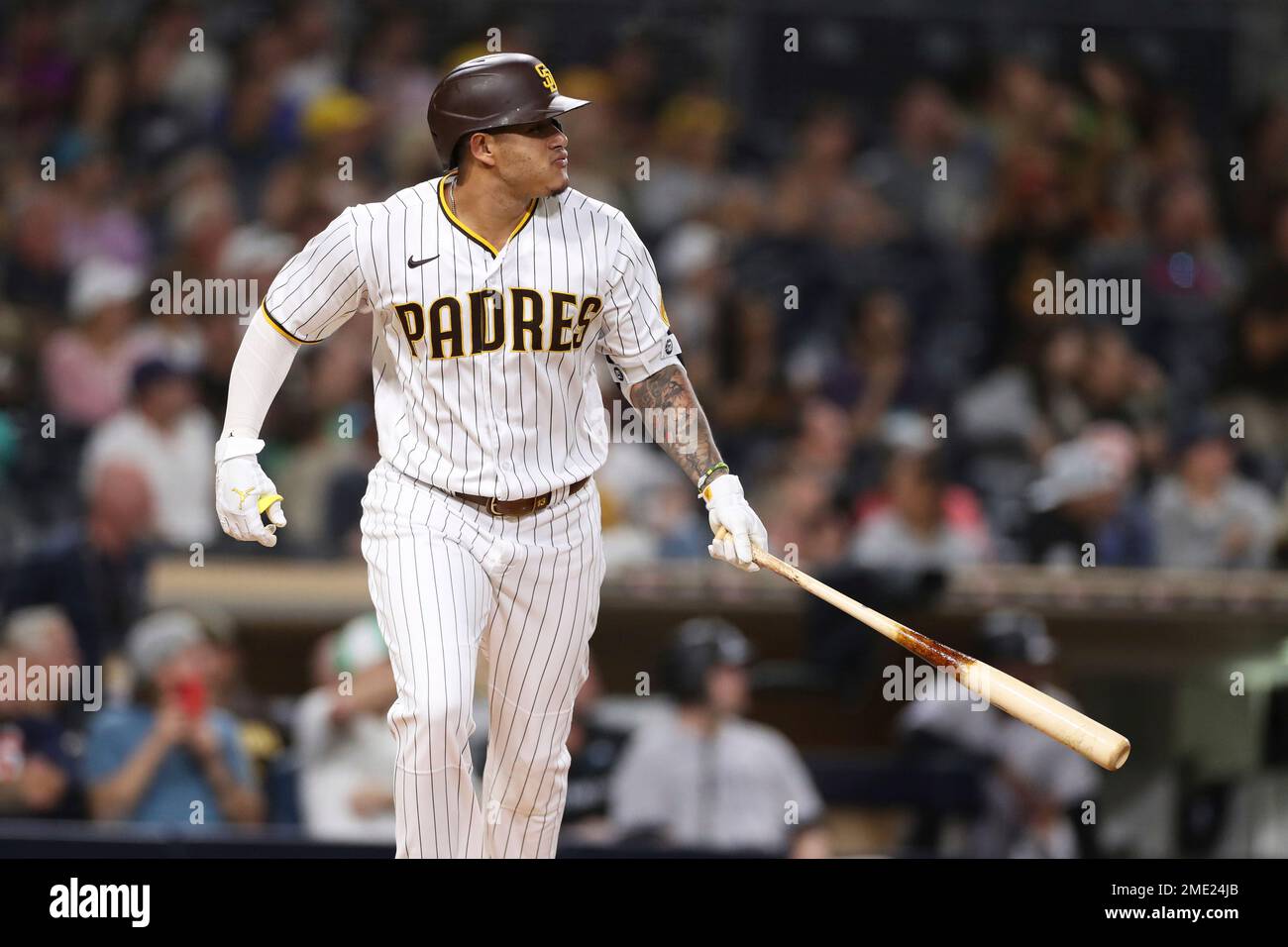 San Diego Padres' Manny Machado watches his two-run home run in the ...