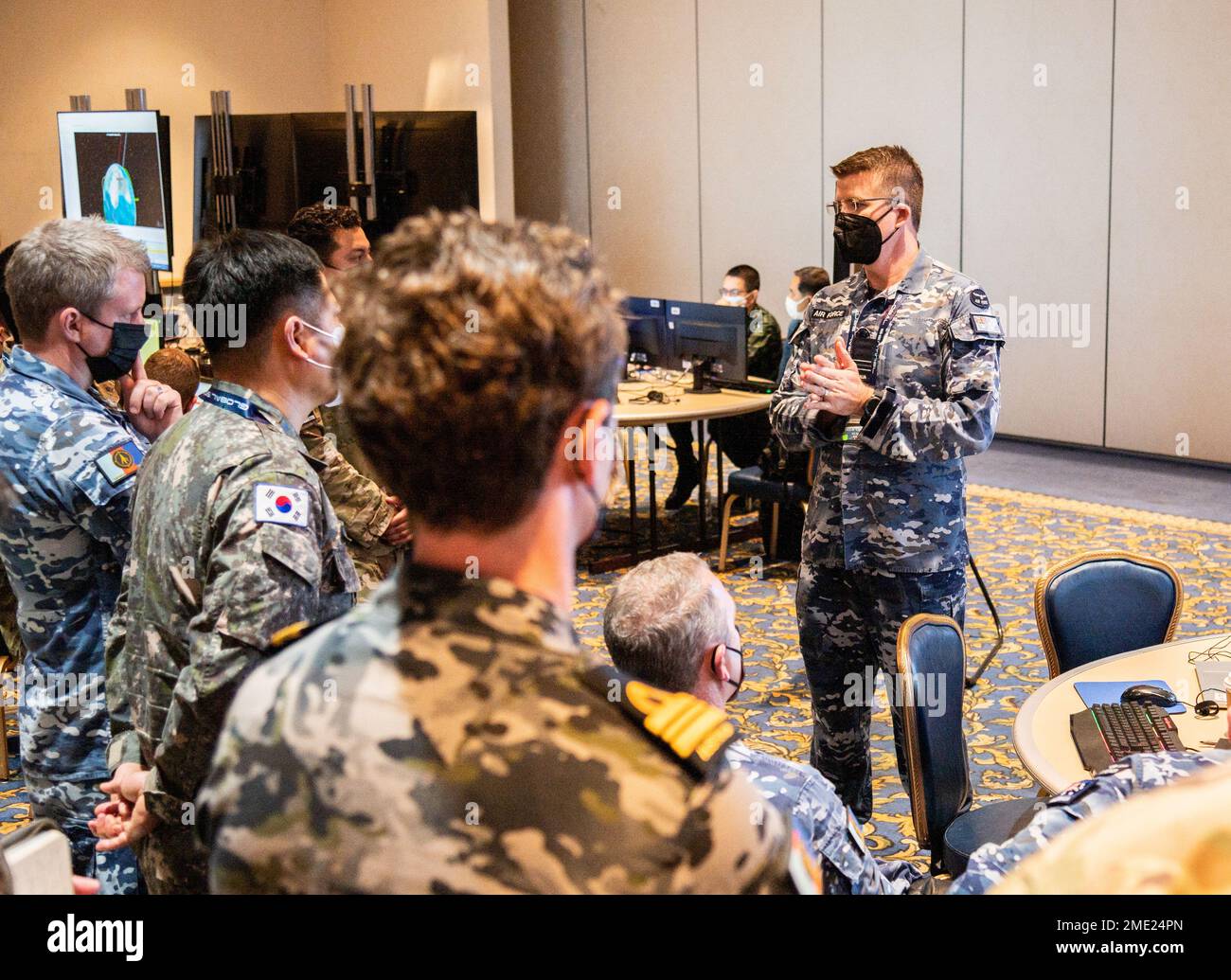 Australian Defence Space Command members conduct a brief on the ...