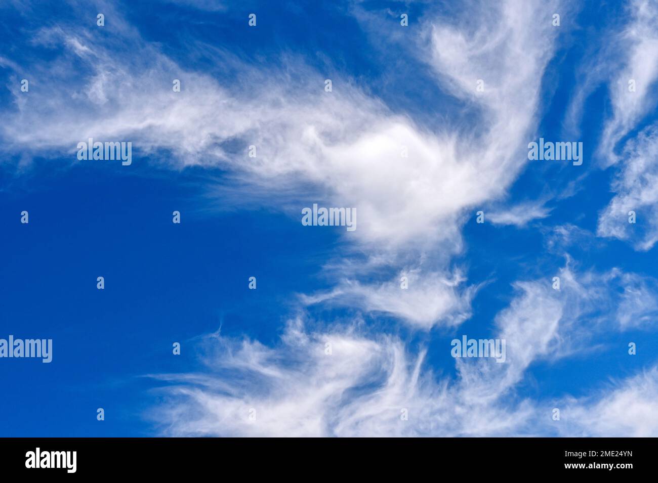 White cirrus clouds in a deep blue sky. No people. Backgrounds Stock ...