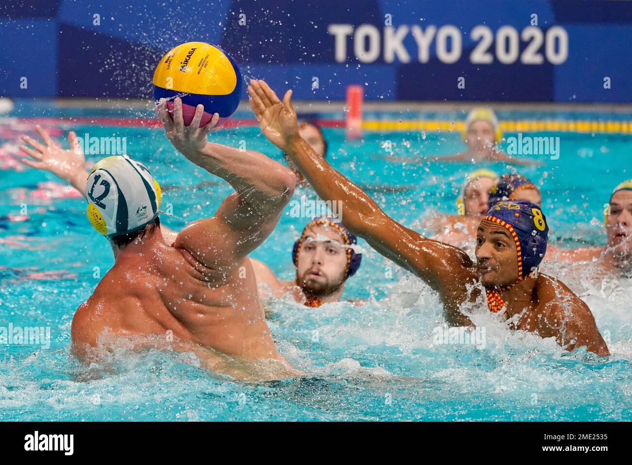 Australia's Blake Edwards (12) shoots as he is defended by Spain's ...