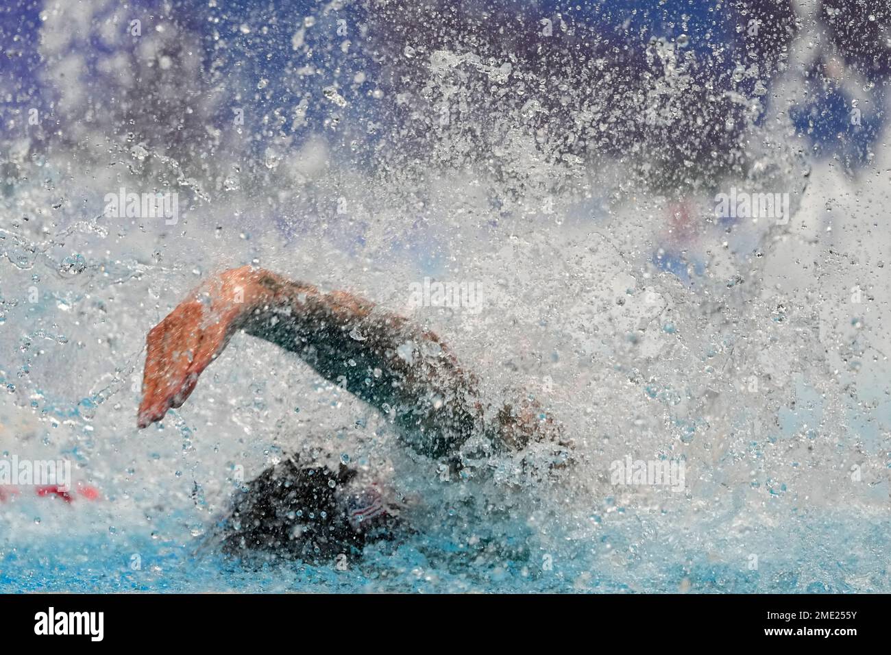 Caeleb Dressel, of the United States, swims in a men's 50-meter ...